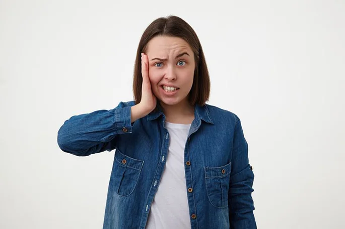 Bruxism (Teeth Grinding): Symptoms, Causes, Risk Factors & Treatments